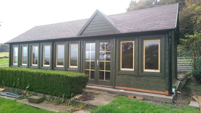 Lauren Clockhouse UPVC Log Cabin | Tuin Garden Rooms